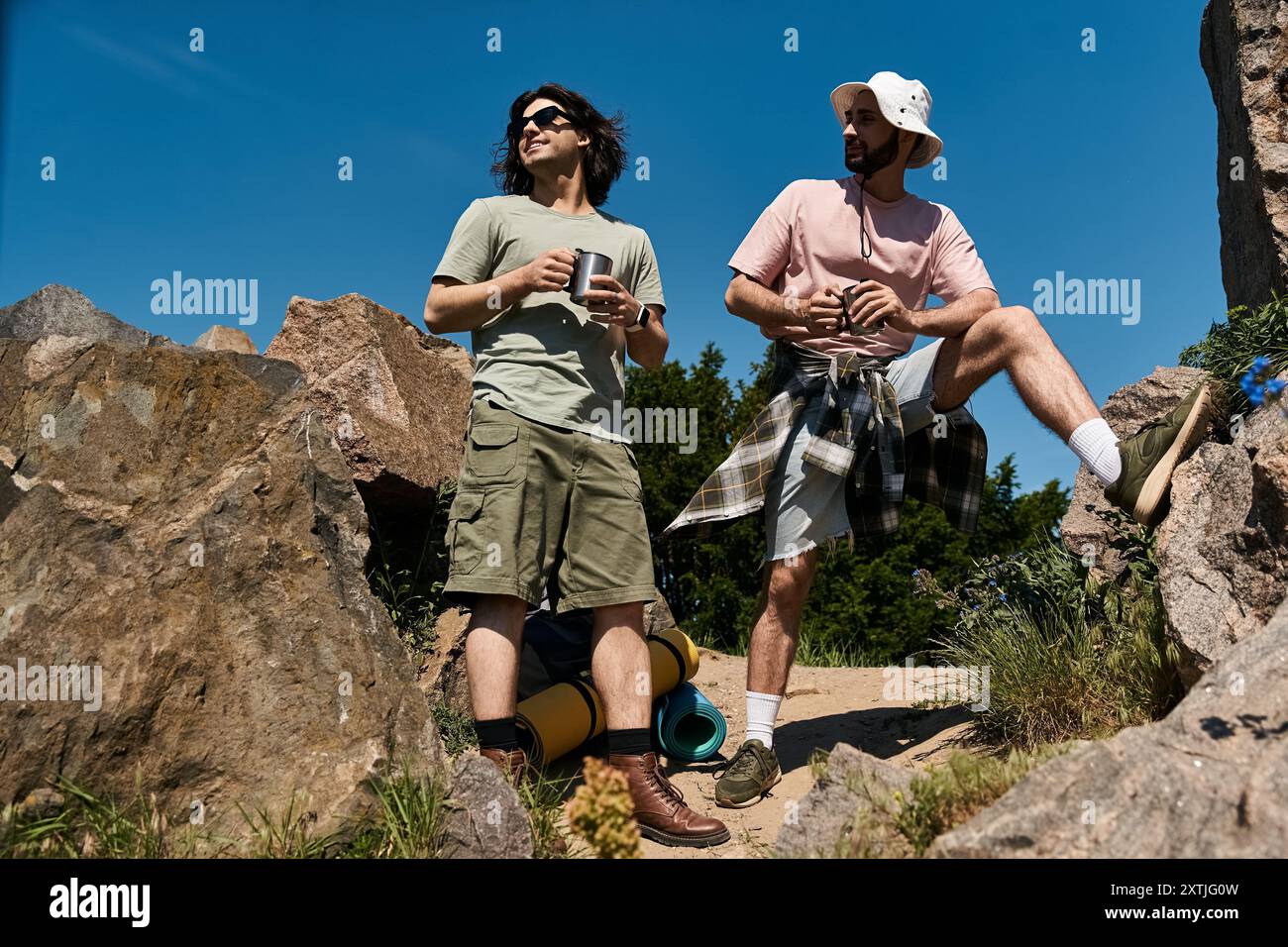 Two hikers mountains enjoying view hi-res stock photography and images ...