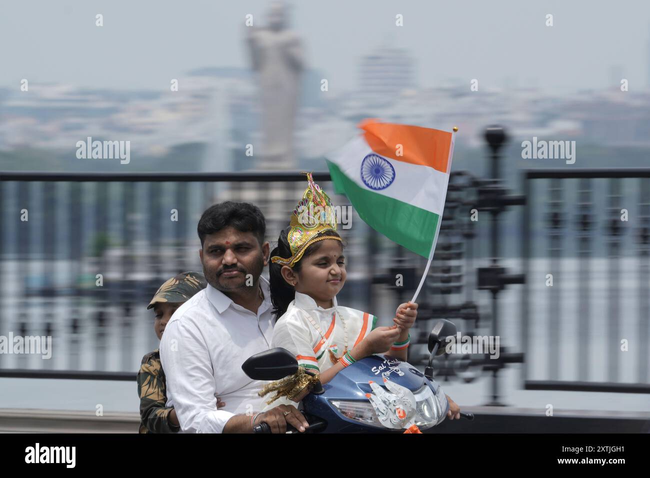 A young child dressed as Bharat Matha (Mother of India) travels on a ...