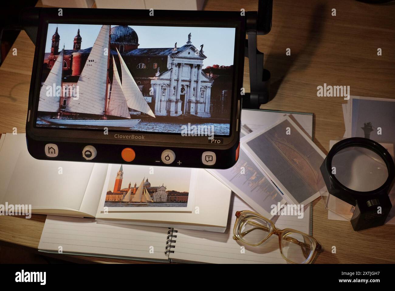 Digital enlargement using a low vision reading aid, a camera and built ...