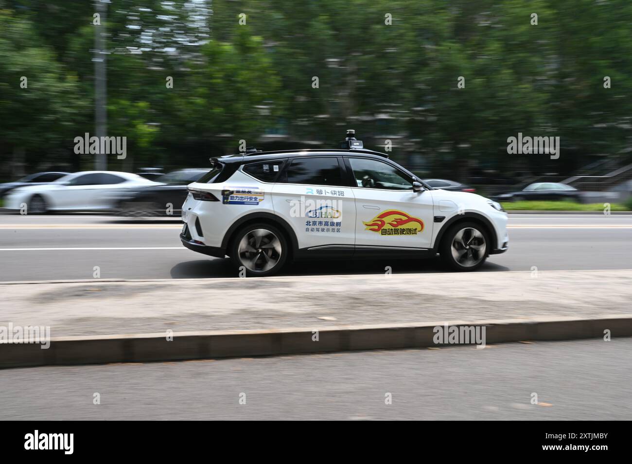 Peking, China. 15th Aug, 2024. An autonomous cab from the provider ...