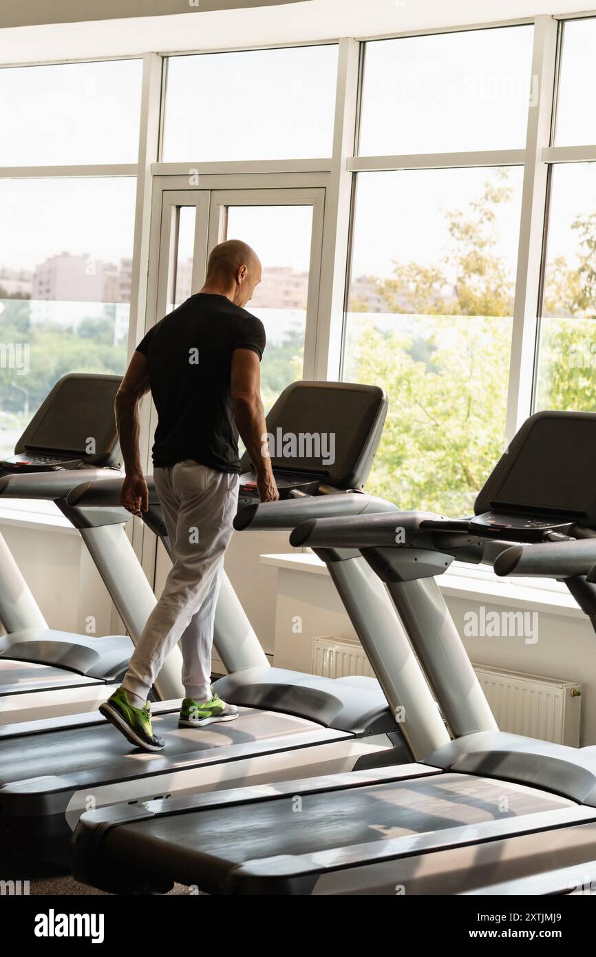 Athlete man walking on treadmill hi-res stock photography and images ...