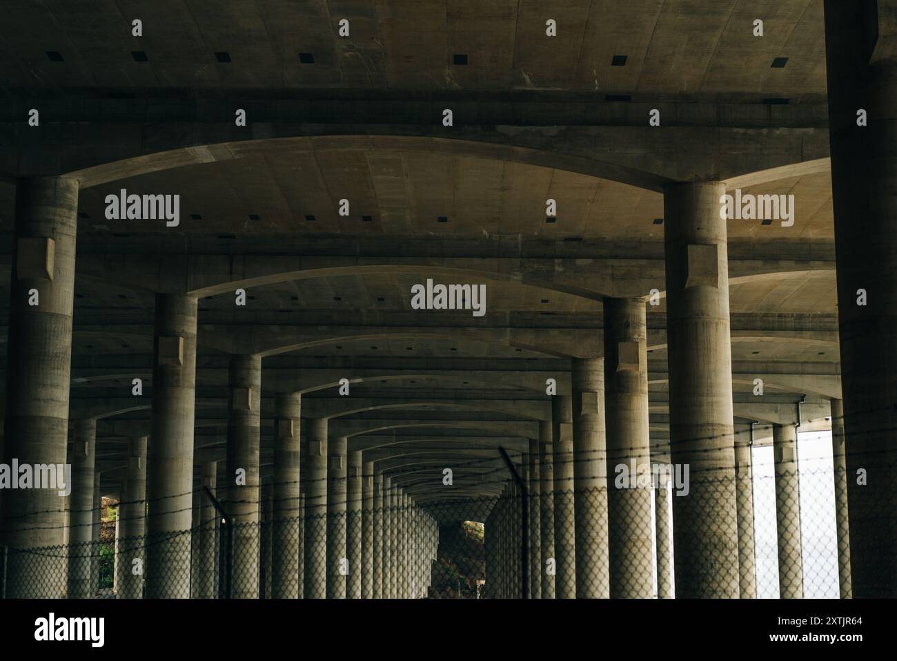 Concrete pillars with metal embedded parts and slab. Structures of ...