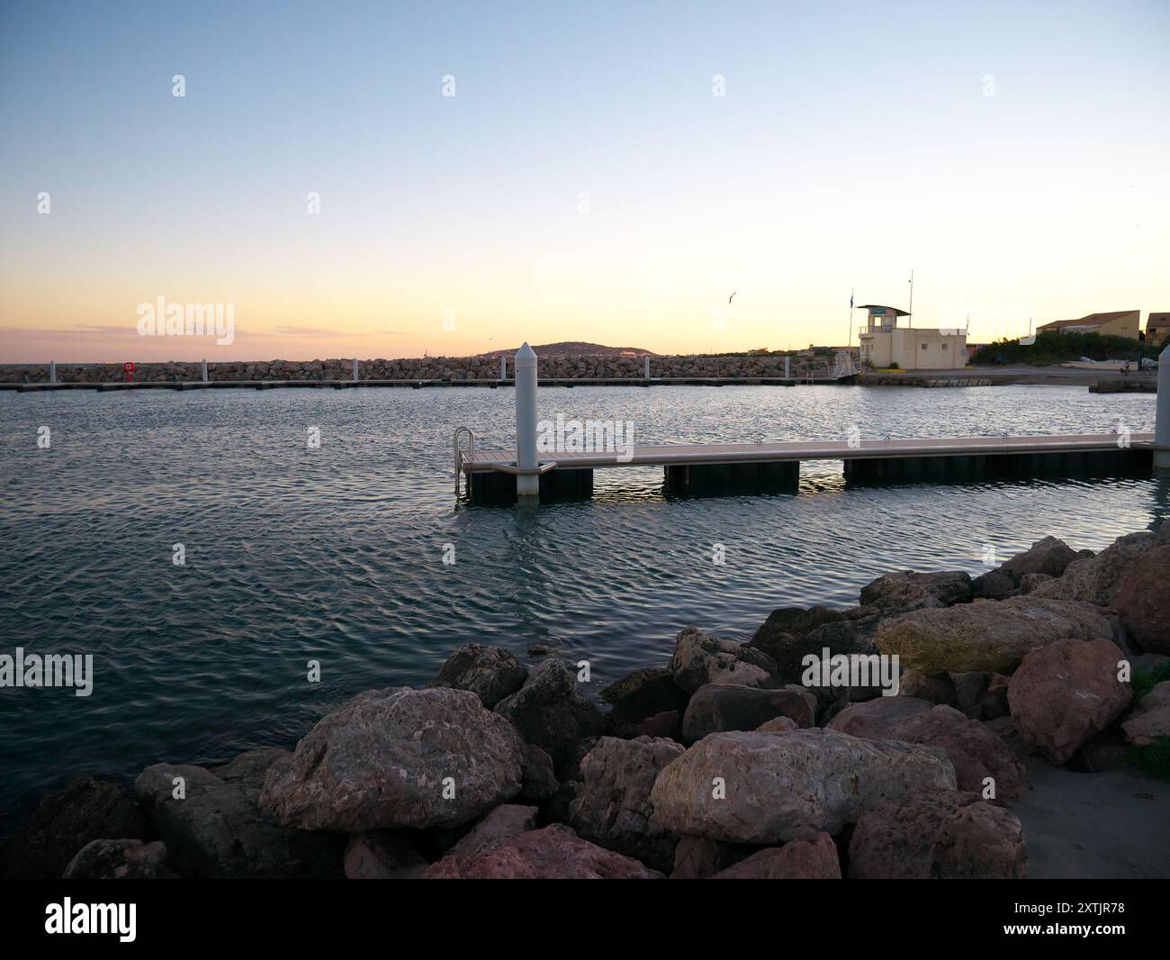 Beautiful photo of a marina pontoon during sunset in France Stock Photo ...