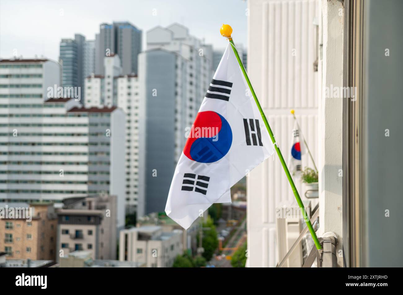 Taegeukgi hanging on the exterior wall of an apartment on National Day ...