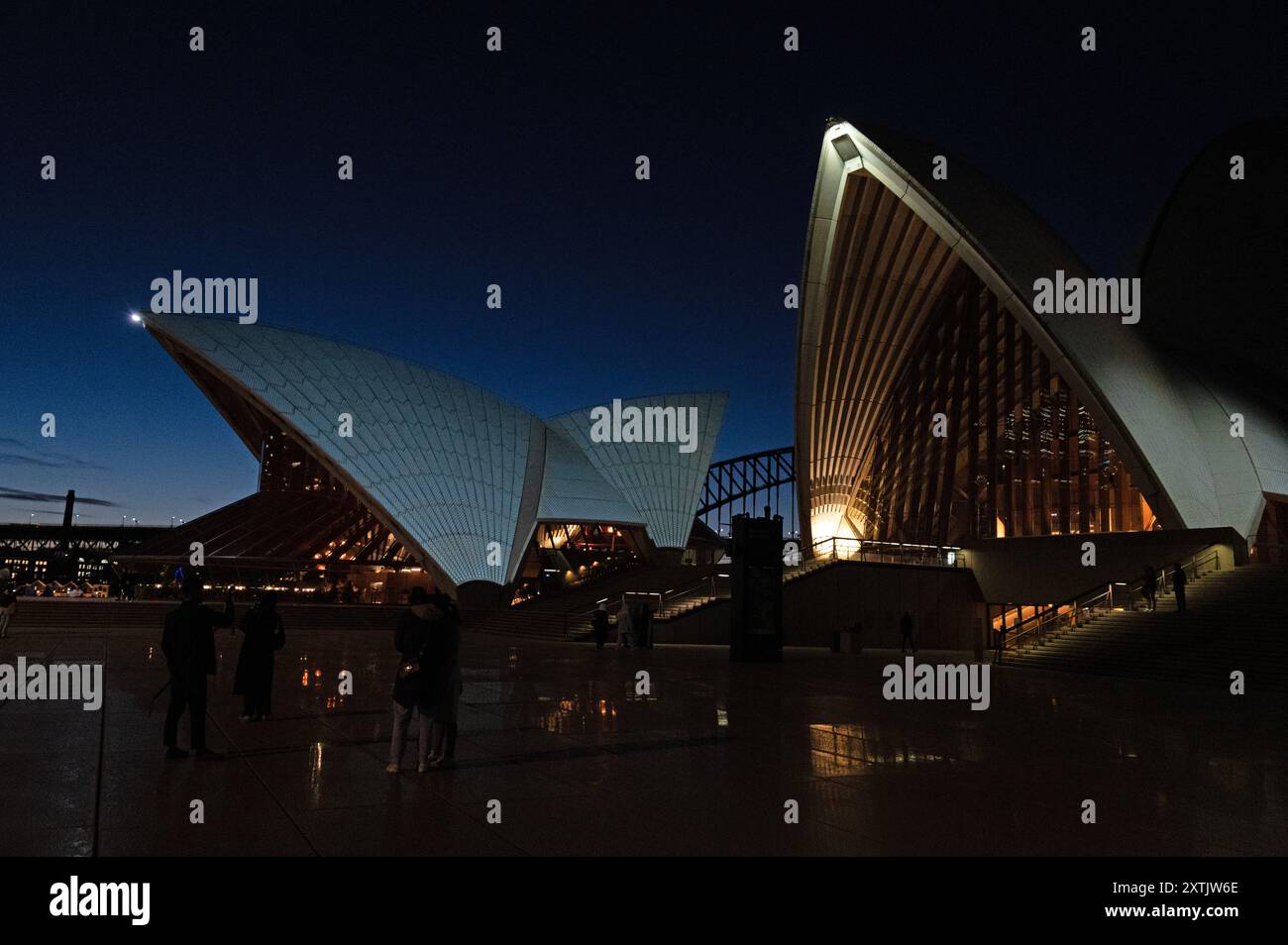 One of Sydney’s landmarks is the Opera House at autumn dusk in Sydney ...