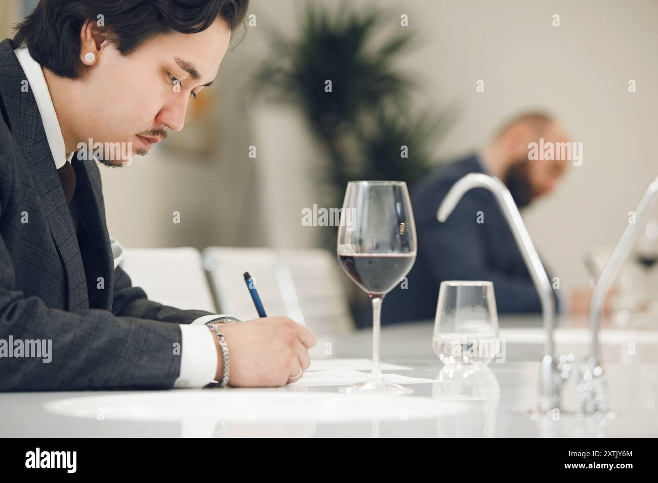 Aspiring Sommelier in Wine Assessment Class. Wine tasting training ...