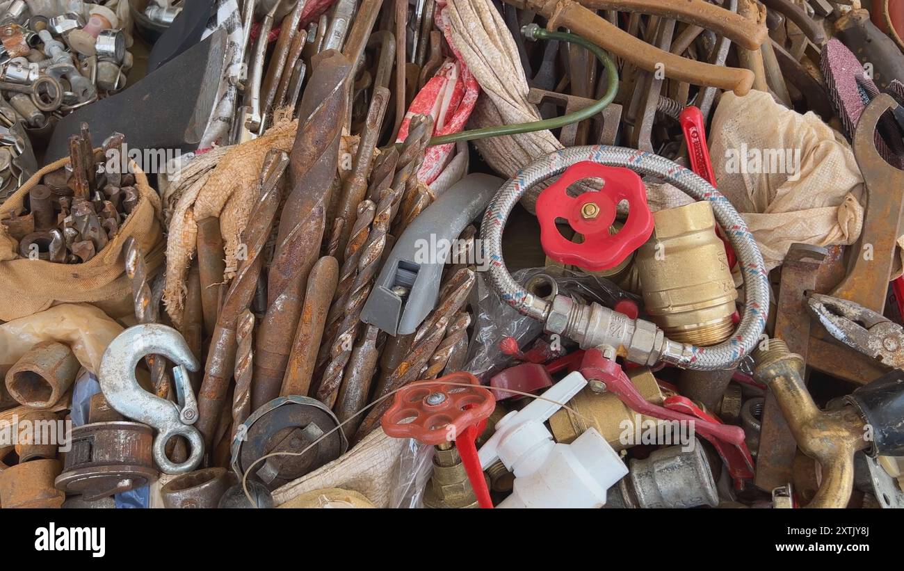 A flea market of old rusty things and tools Stock Photo - Alamy
