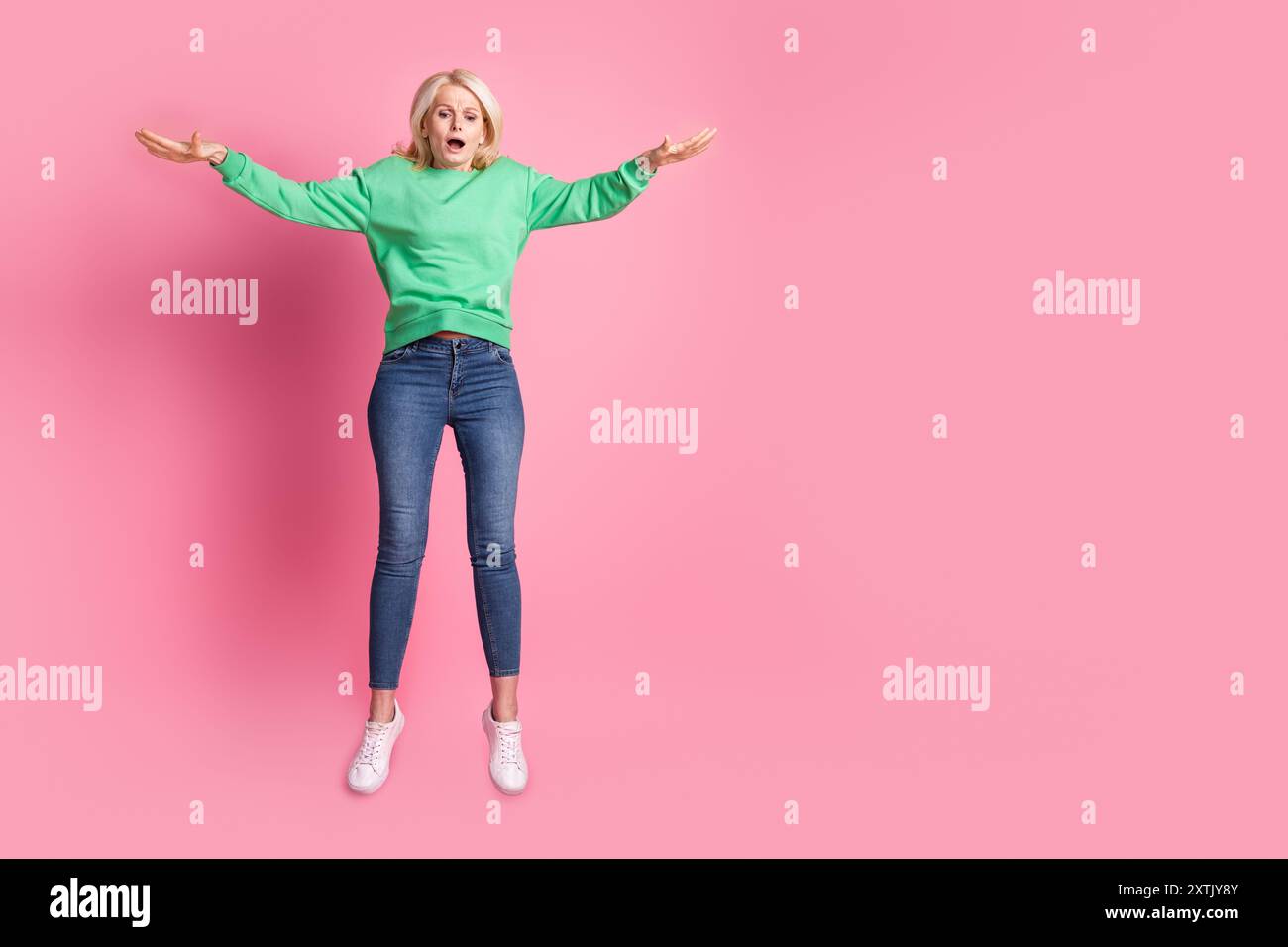 Full body photo of attractive retired woman jump falling scared dressed ...