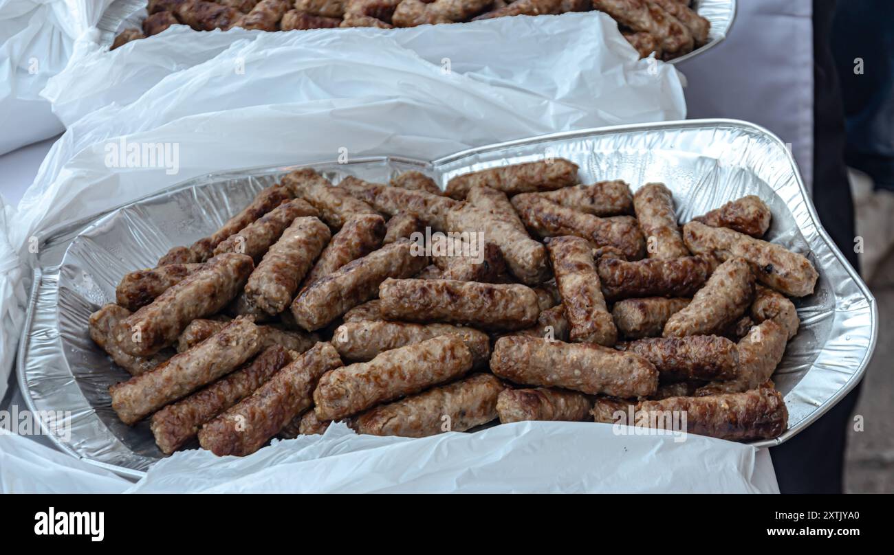 Free tasting of cevapi on Bascarsija Stock Photo - Alamy
