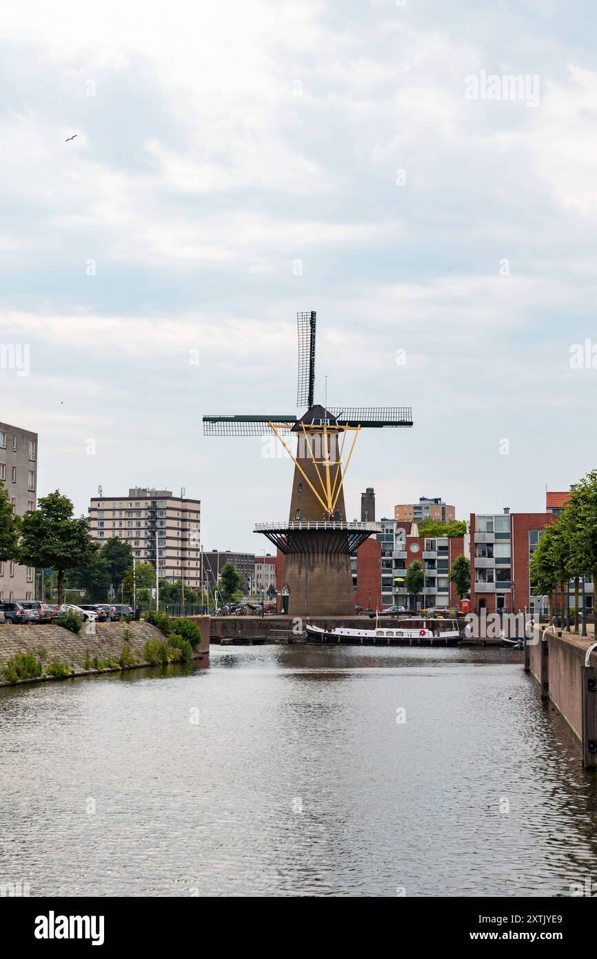Wind mill in Rotterdam Historic wind mill at the Delfshaven district in ...