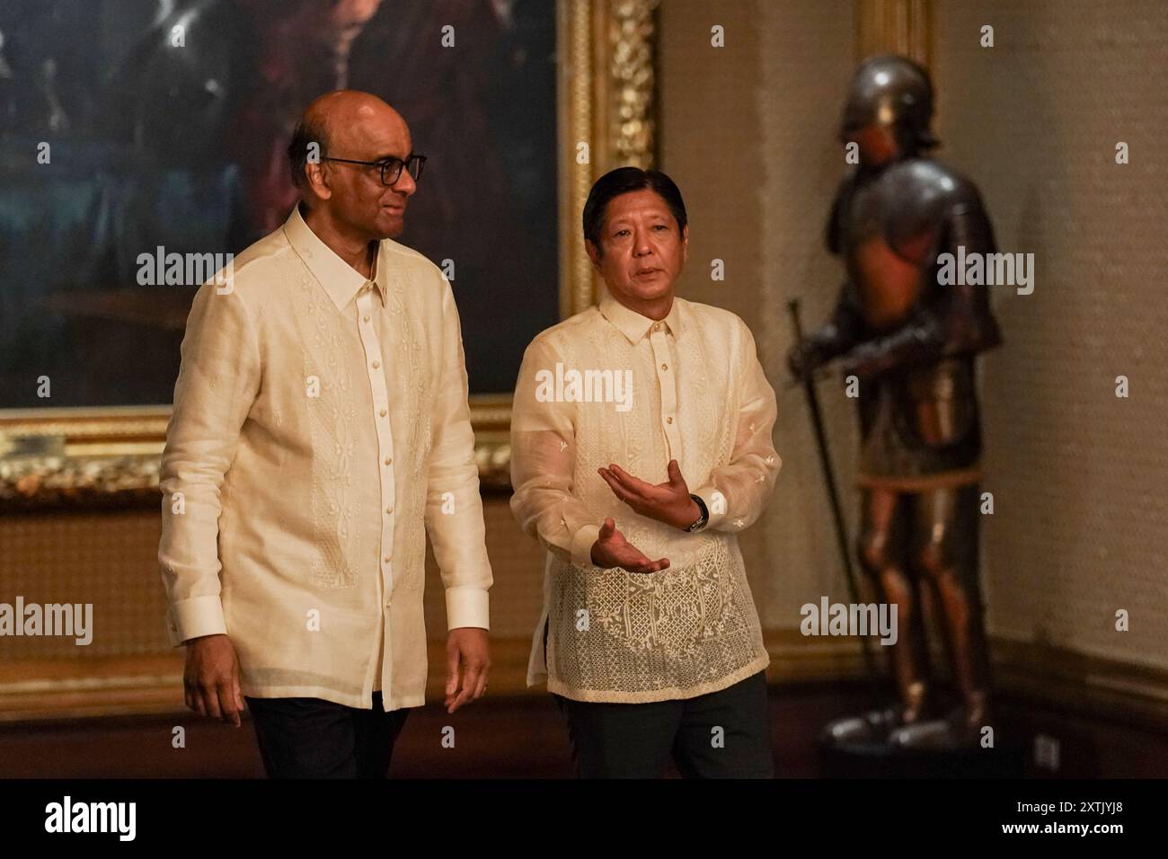 Singapore President Tharman Shanmugaratnam walks alongside Philippine ...