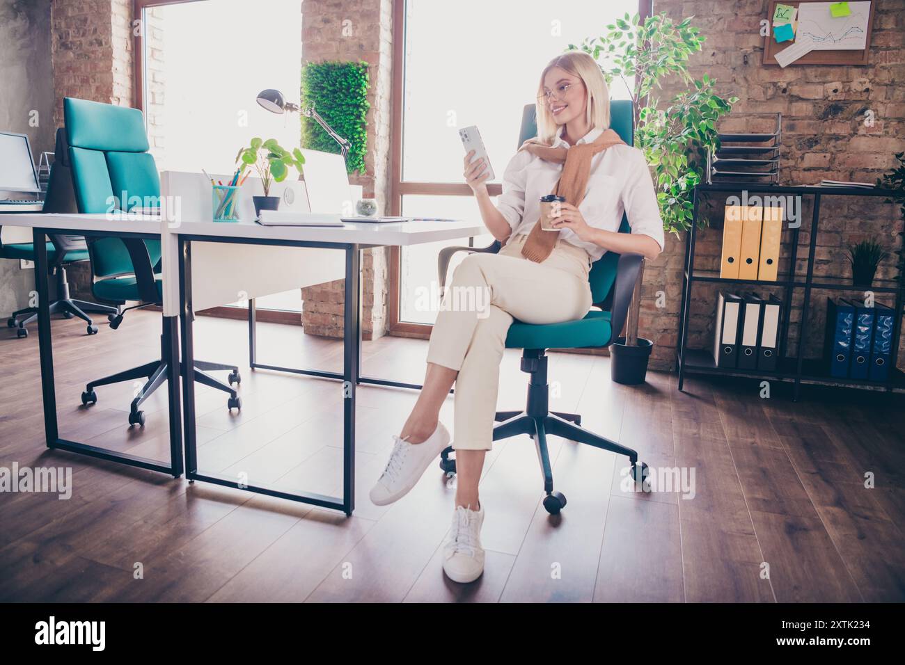 Full length photo of lovely young lady hold device coffee dressed ...