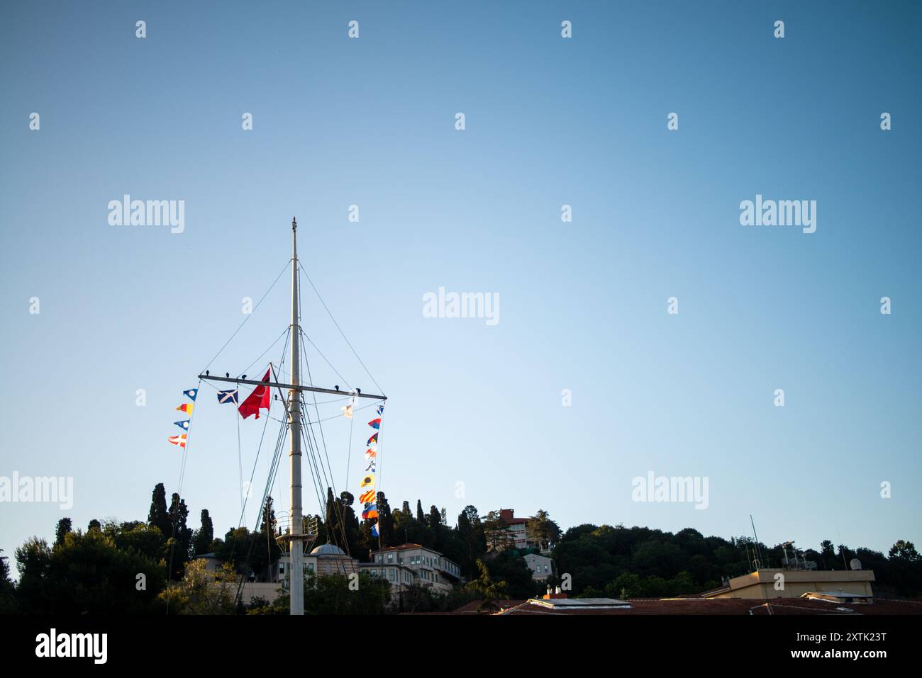 A vibrant display of maritime flags, each representing different ...