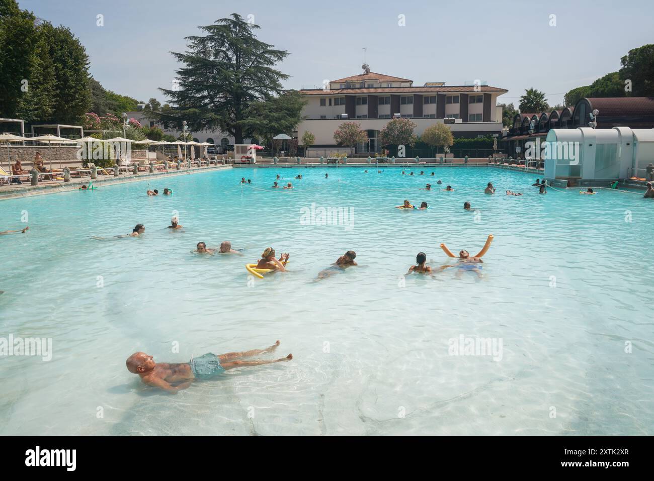 Viterbo, Italy. 15 August 2024. People cooling at the Thermal baths in ...