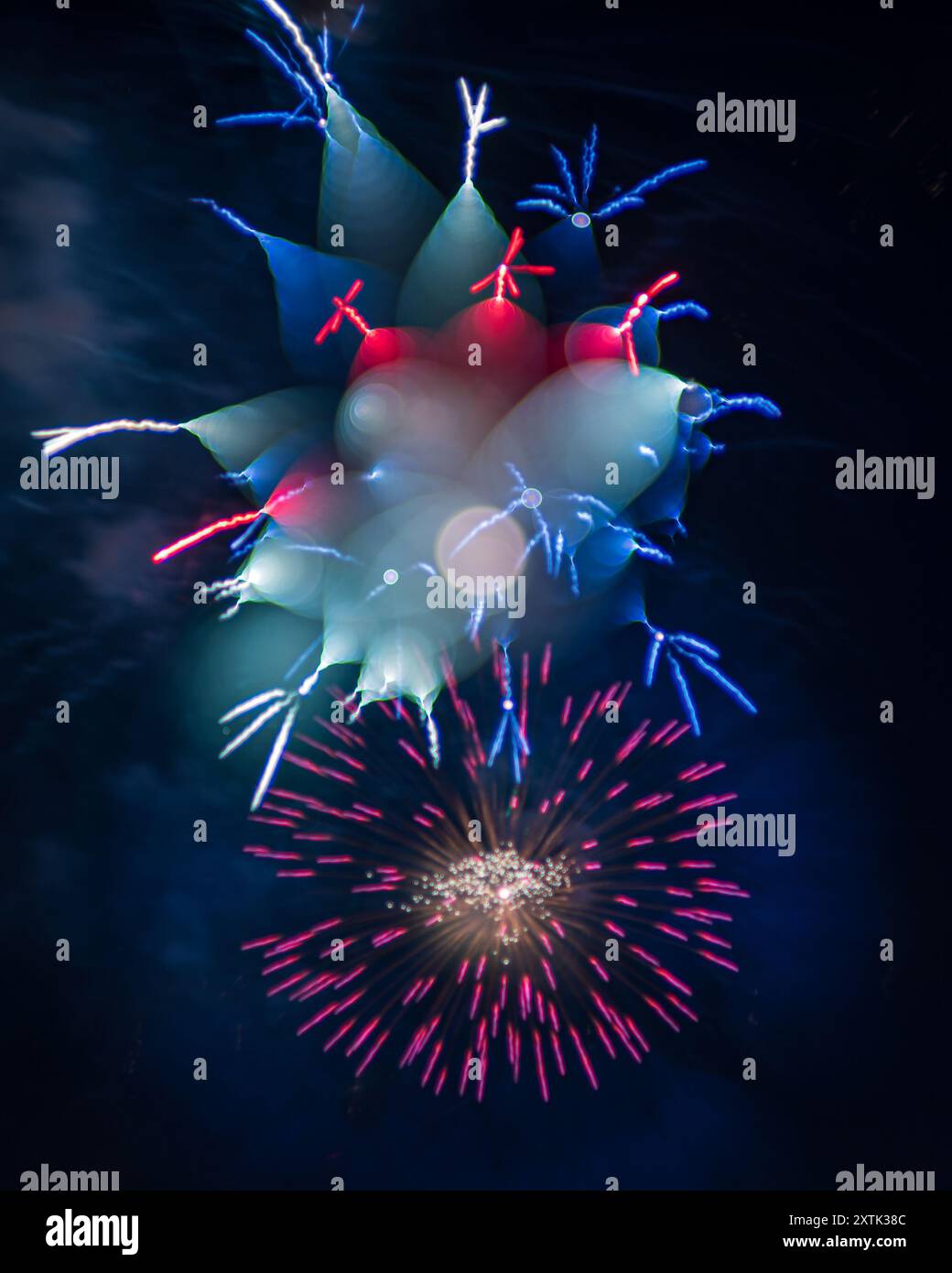 A vibrant display of fireworks lighting up the night sky with colorful ...