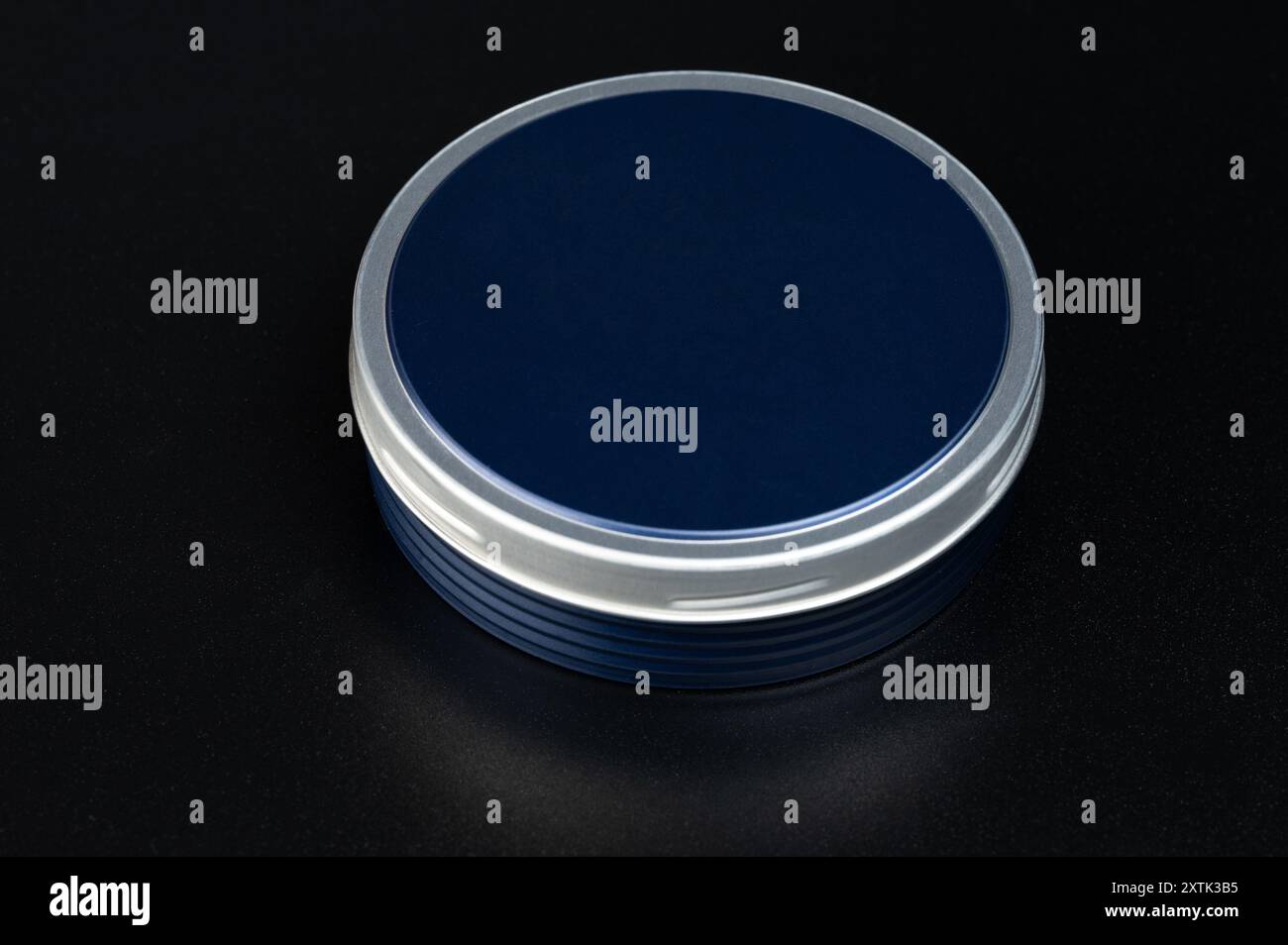 Metal round can box perspective view isolated on studio background ...