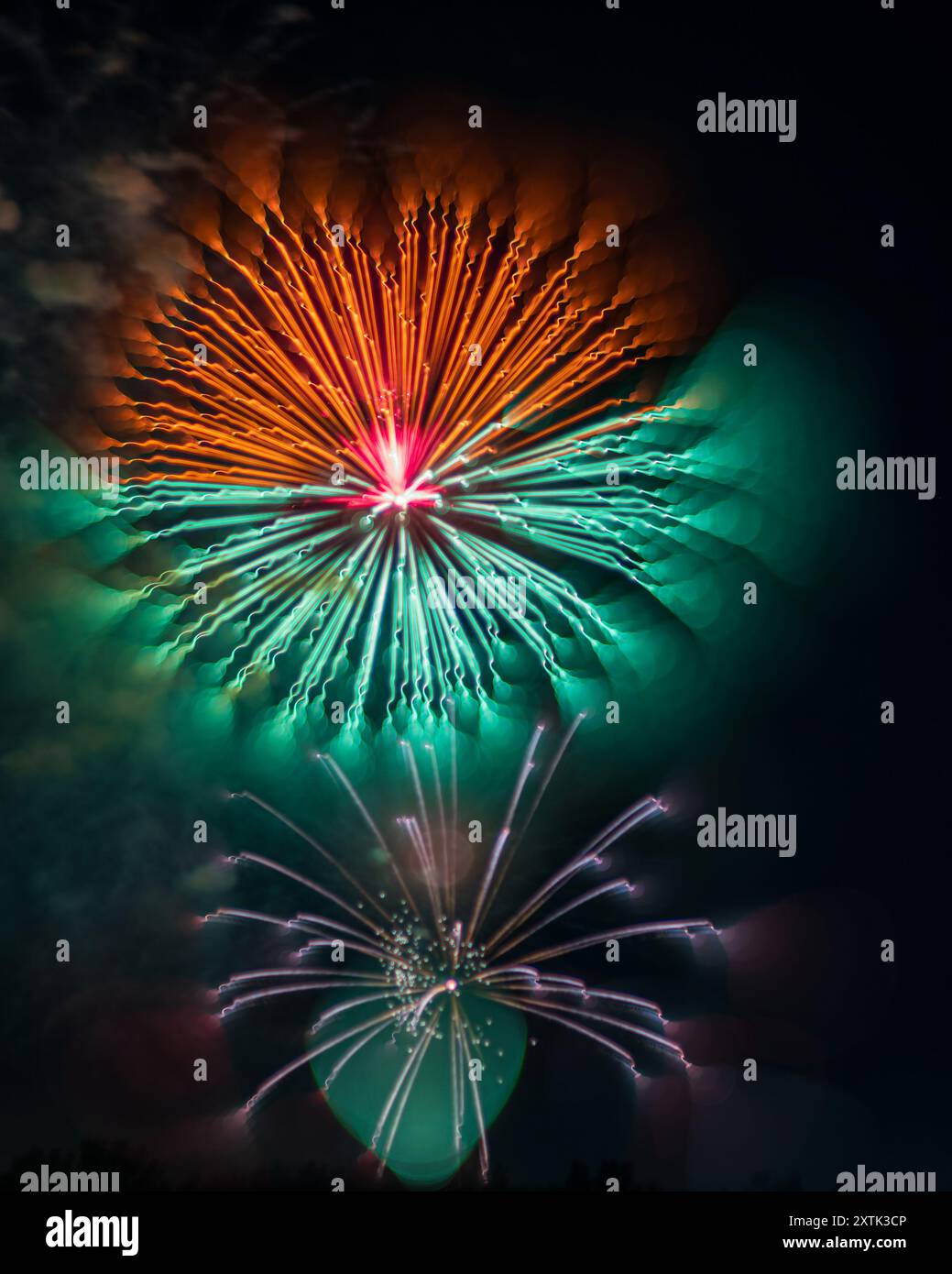The vibrant fireworks display lighting up the night sky with colorful ...