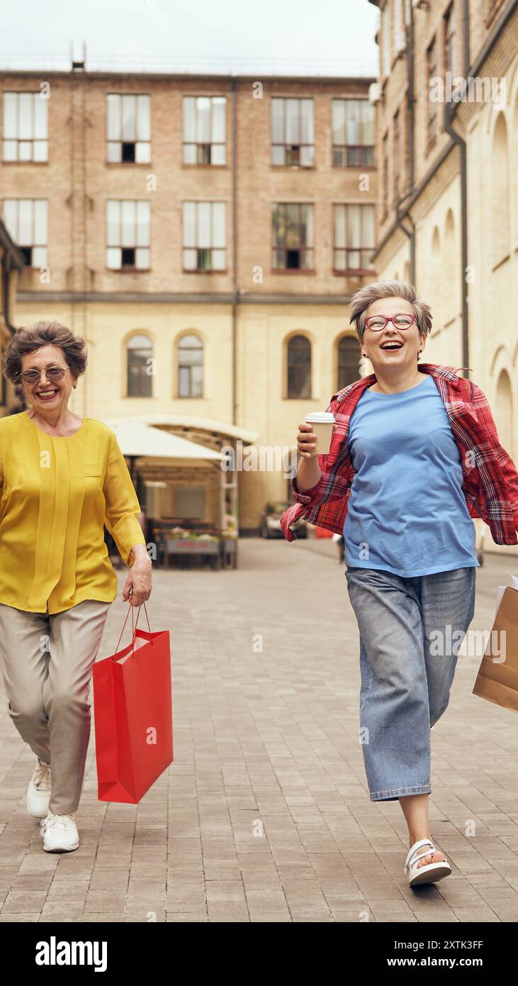 Senior people enjoying a day out shopping hi-res stock photography and ...
