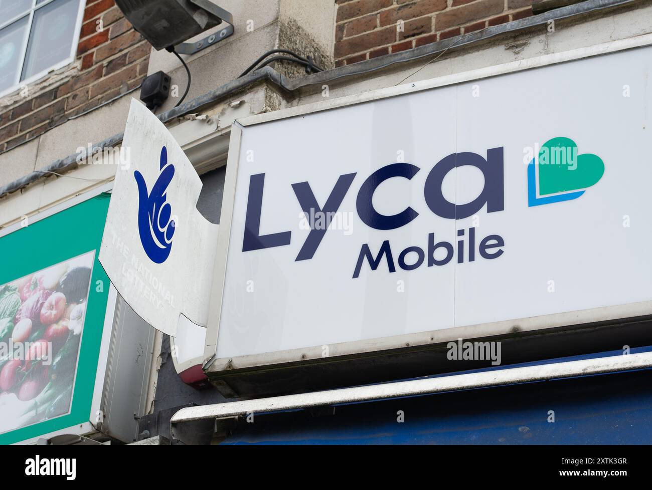 Slough, UK. 15th August, 2024. LycaMobile adverts outside shops in ...