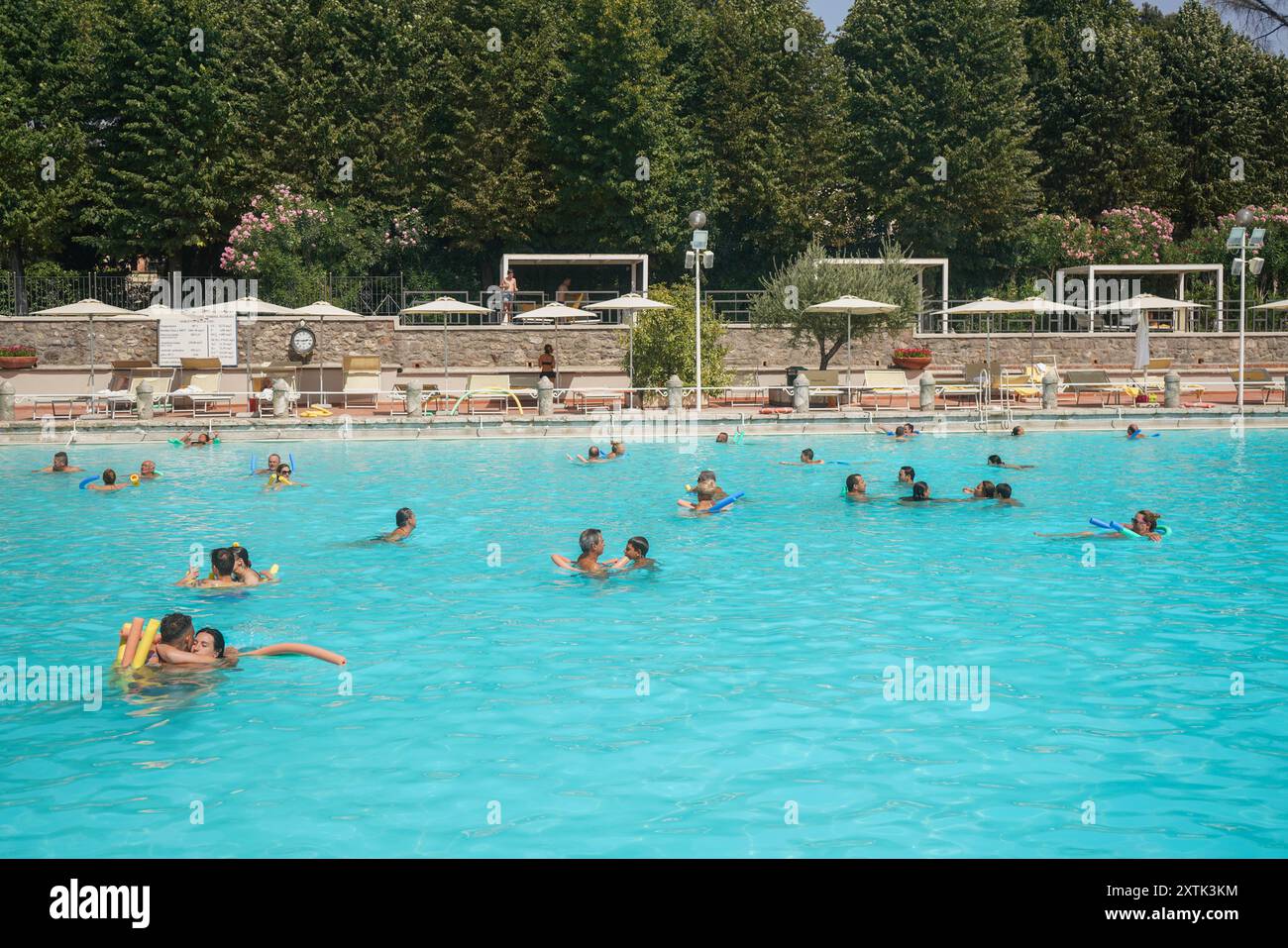 Viterbo, Italy. 15 August 2024. People cooling at the Thermal baths ...