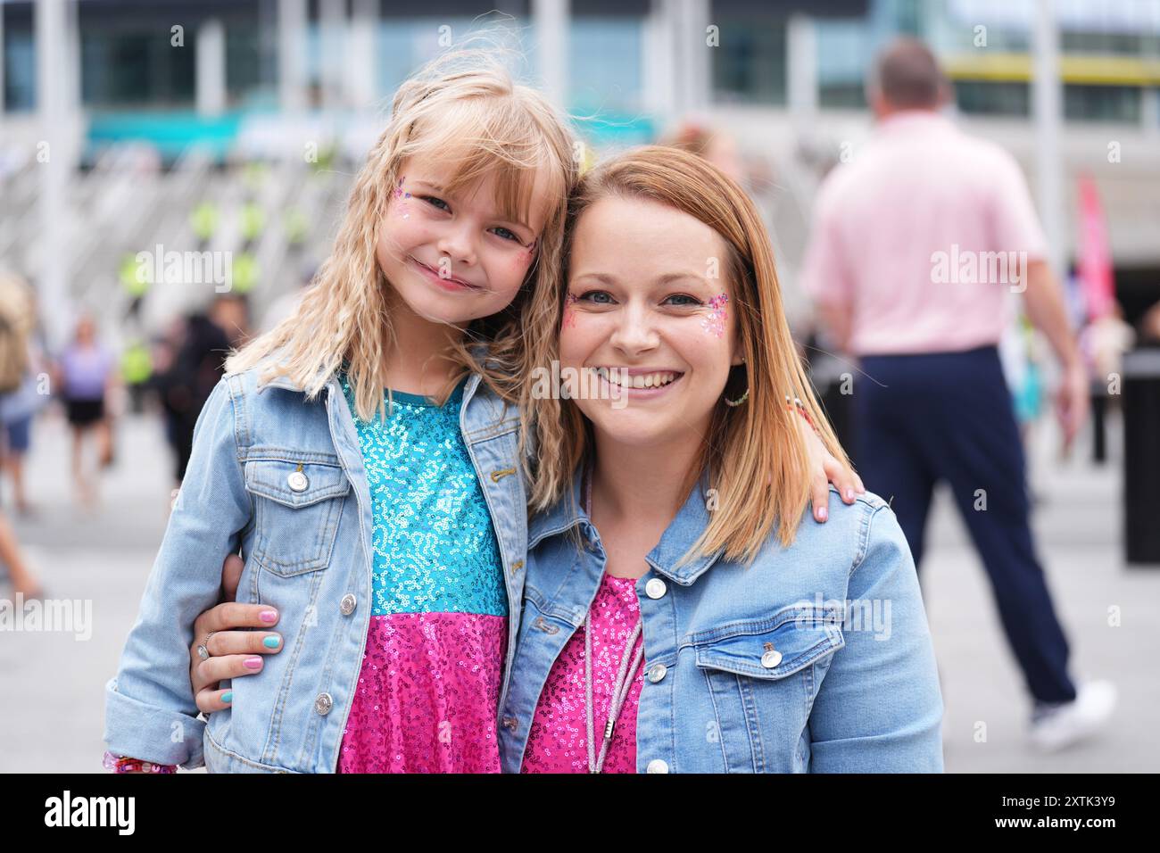 (left to right) Violet Morris, 5, and her mother Sarah Morris, 35, pose for a photo outside ...