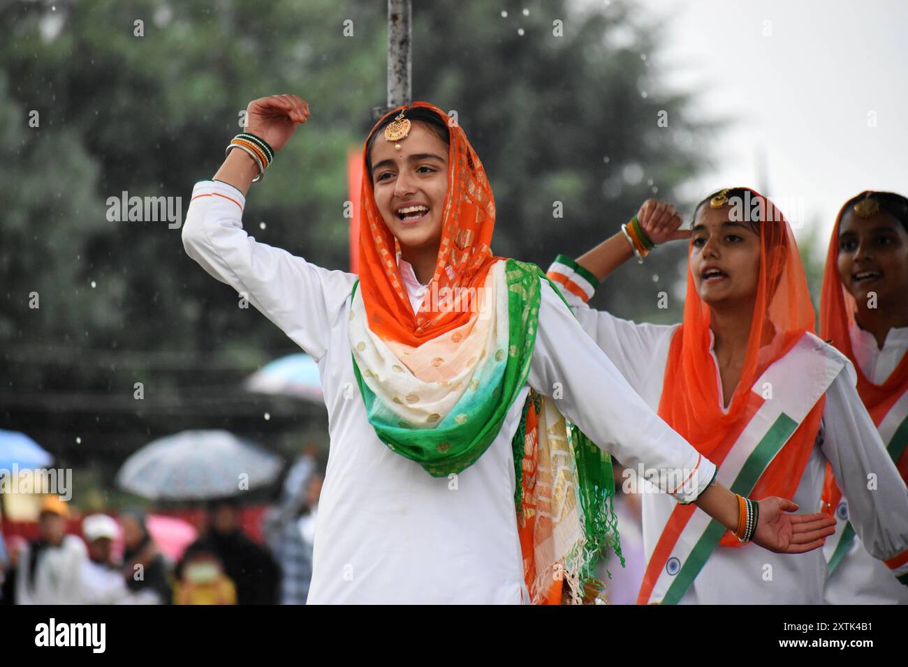 Srinagar, Kashmir, India, on 15 Aug, 2024: Schoolgirls adorned with ...