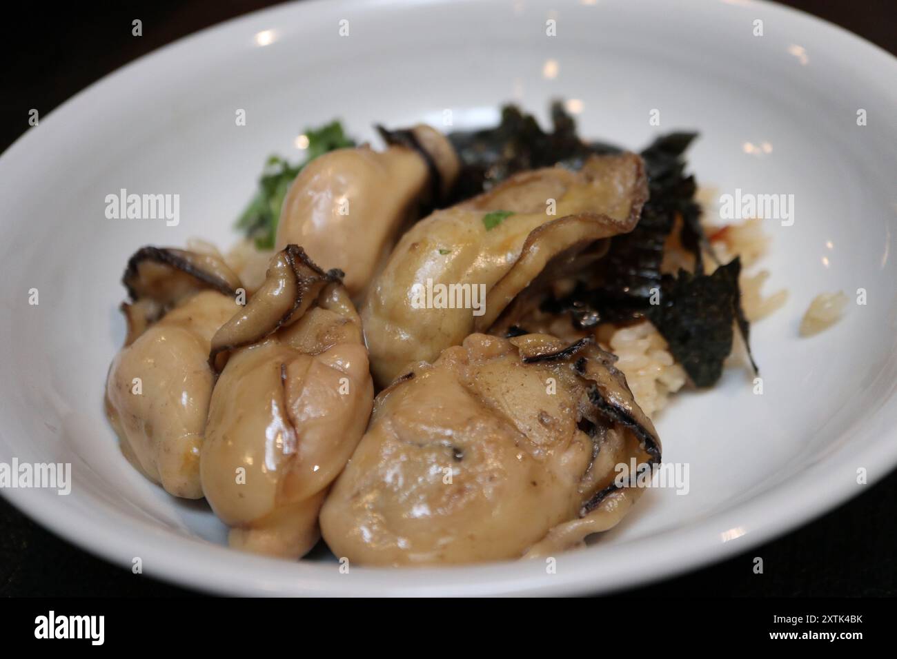 Japanese cuisine: kakimeshi (rice cooked with stewed oysters) in ...