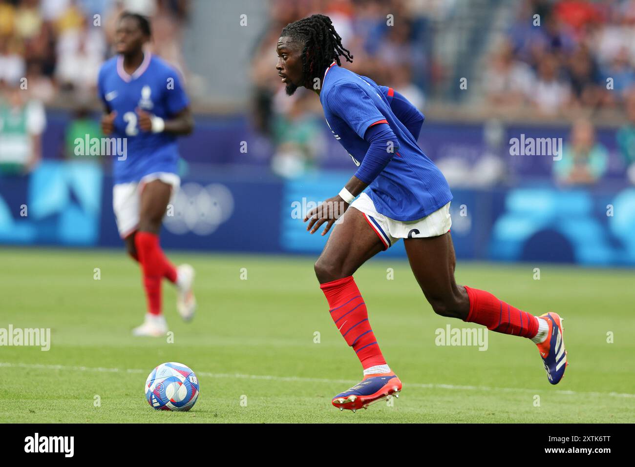 PARIS, FRANCE - AUGUST 09: Manu Kone of Team France runs with a ball ...