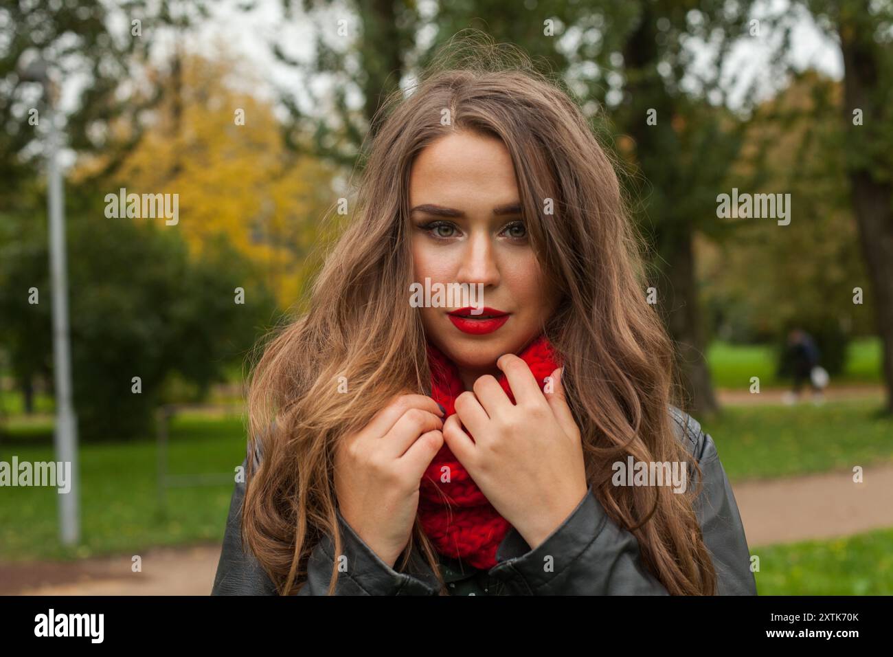 Elegant lady in fall park hi-res stock photography and images - Alamy