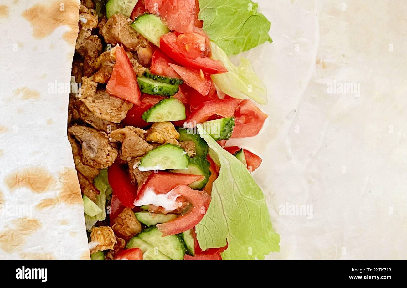 Delicious chicken shawarma with white background, flat lay, top view ...
