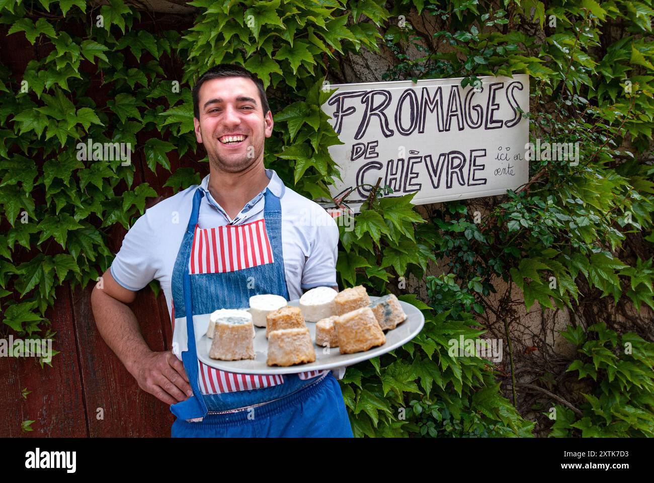 CHÈVRE French Cheesemaker happily displaying a selection of his Fromage ...