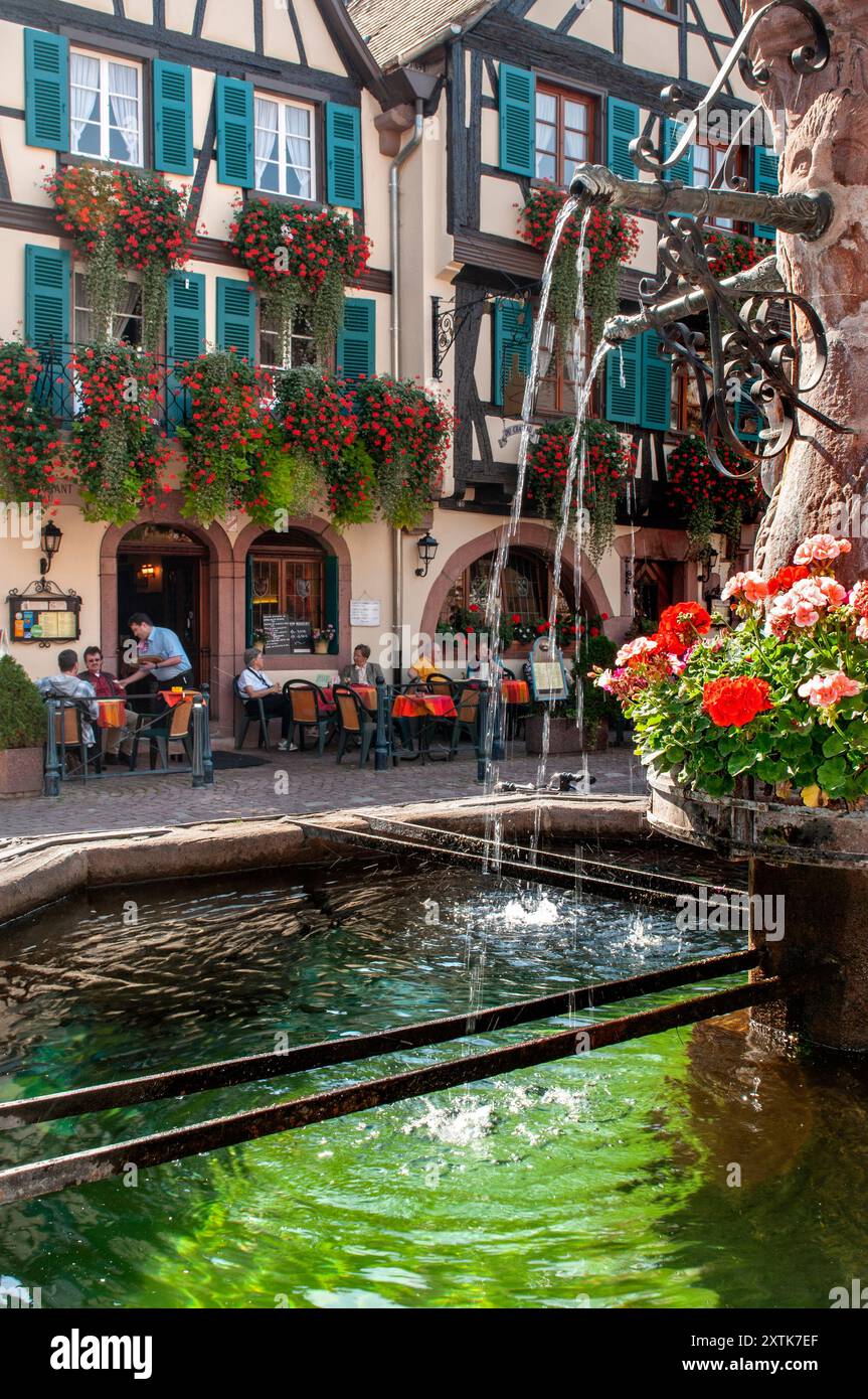 KAYSERSBERG ALSCACE Flower decked fountain in central square with ...