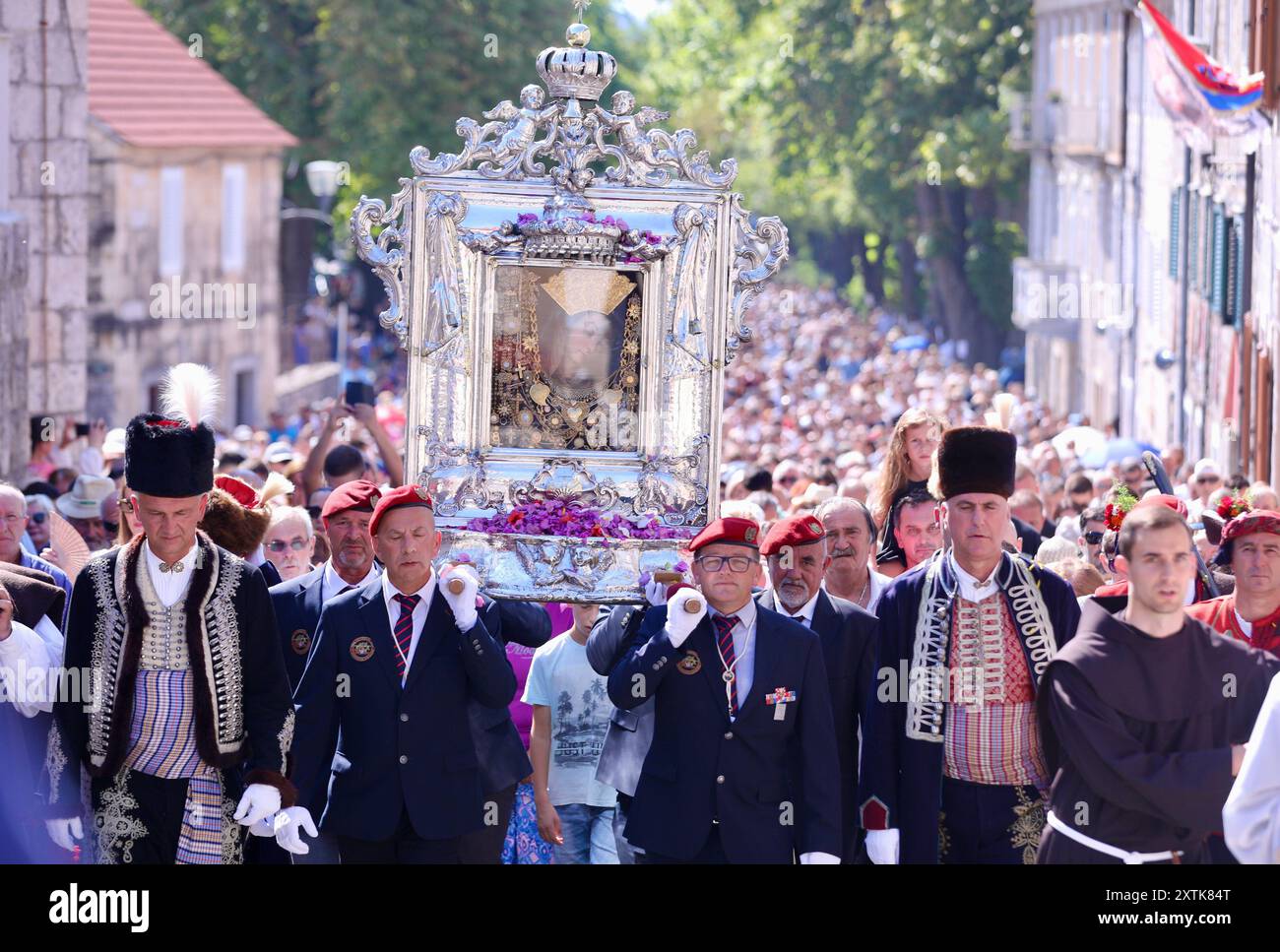 Sinj, Croatia. 15th Aug, 2024. Roman Catholic priests carry The ...