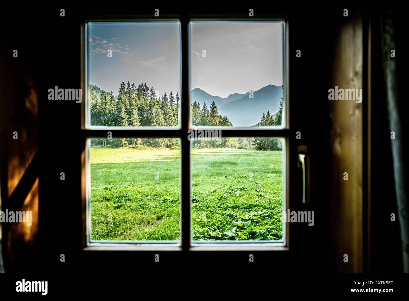 View through a window of the Austrian Alps Stock Photo - Alamy