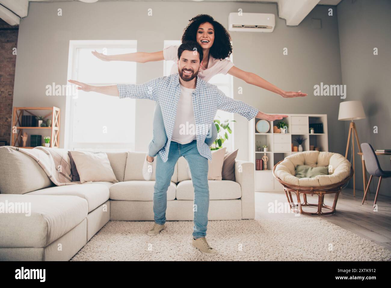 Full size photo of two young idyllic partners piggyback good mood ...