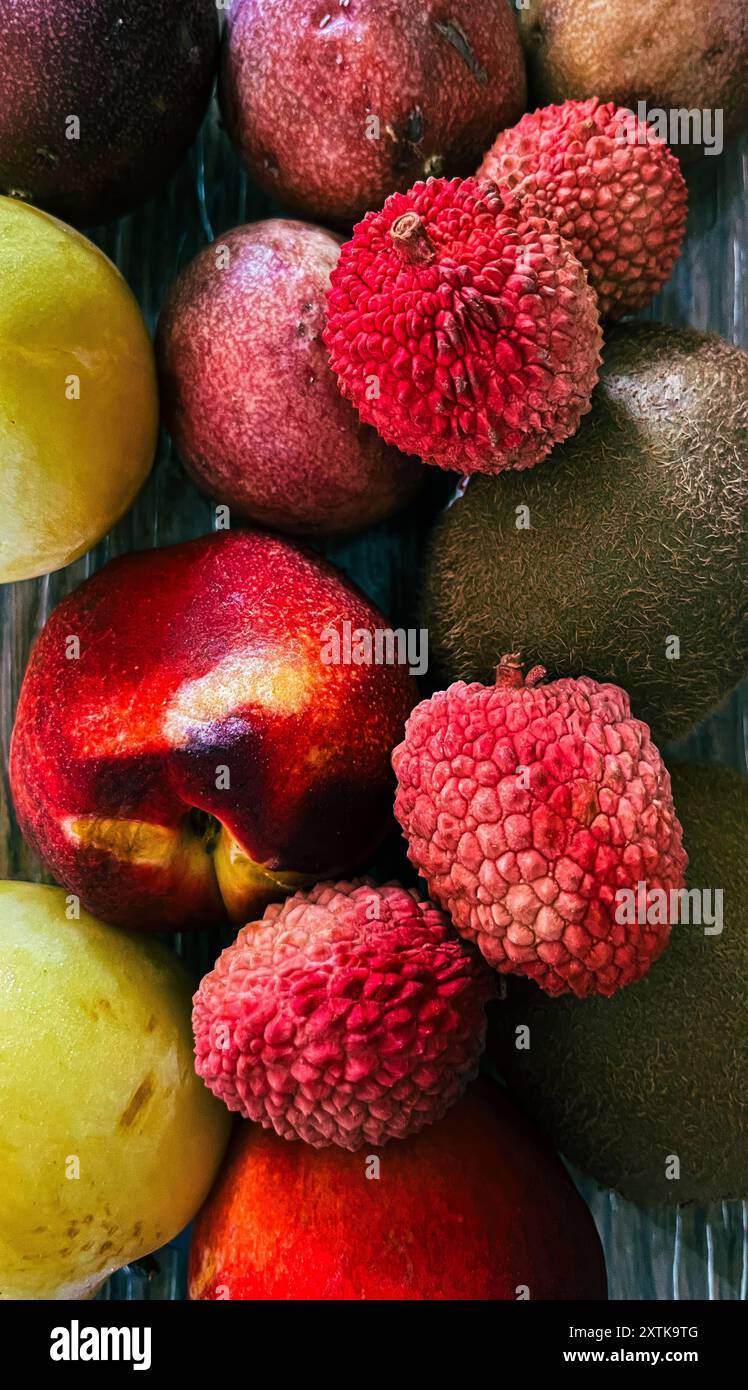 Colorful fruit mix in a ceramic plate. Healthy eating Stock Photo - Alamy