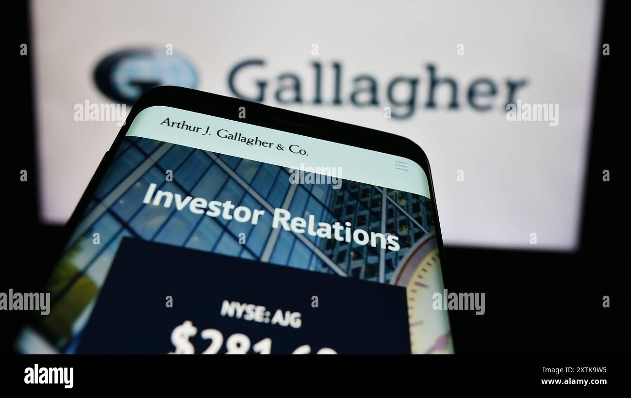 Mobile phone with website of US insurance company Arthur J. Gallagher ...