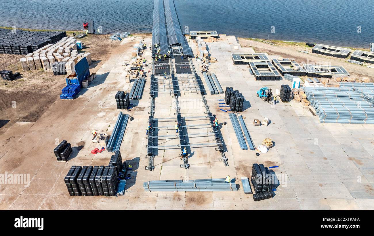 15 August 2024, Brandenburg, Neuendorf: Solar modules for the so-called ...
