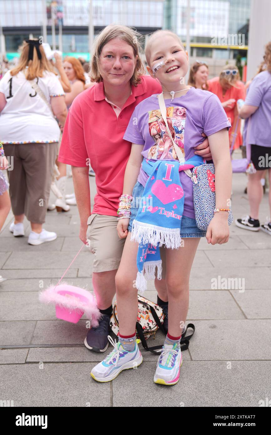 Sophie and Angela Hutton, from Sutton, pose for a photo outside Wembley ...