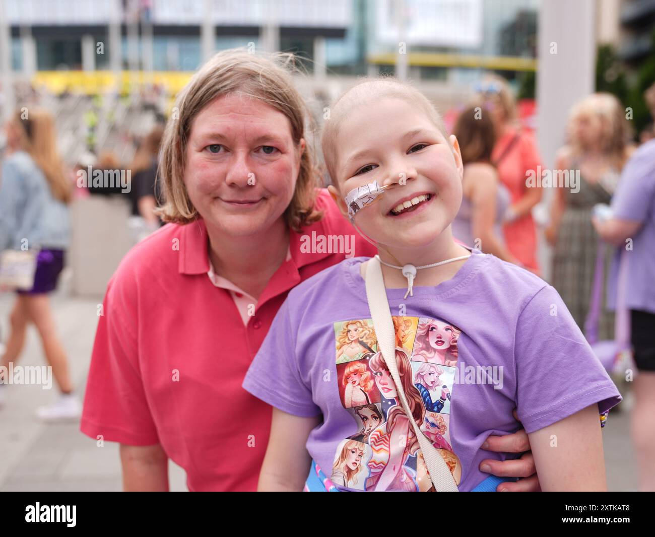 Sophie and Angela Hutton, from Sutton, pose for a photo outside Wembley ...