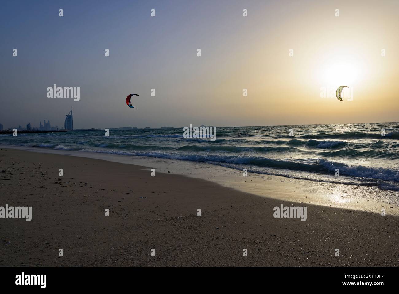 Dubai, UAE, April 4th, 2015. Kite surfing with the iconic Burj Al Arab ...