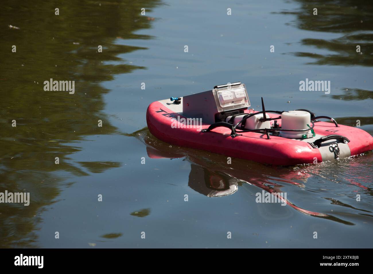 R/C boat measuring flow and velocity of river Stock Photo - Alamy