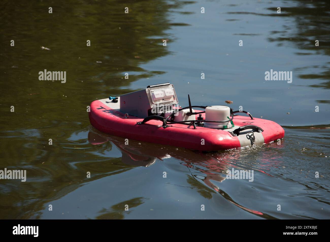 R/C boat measuring flow and velocity of river Stock Photo - Alamy
