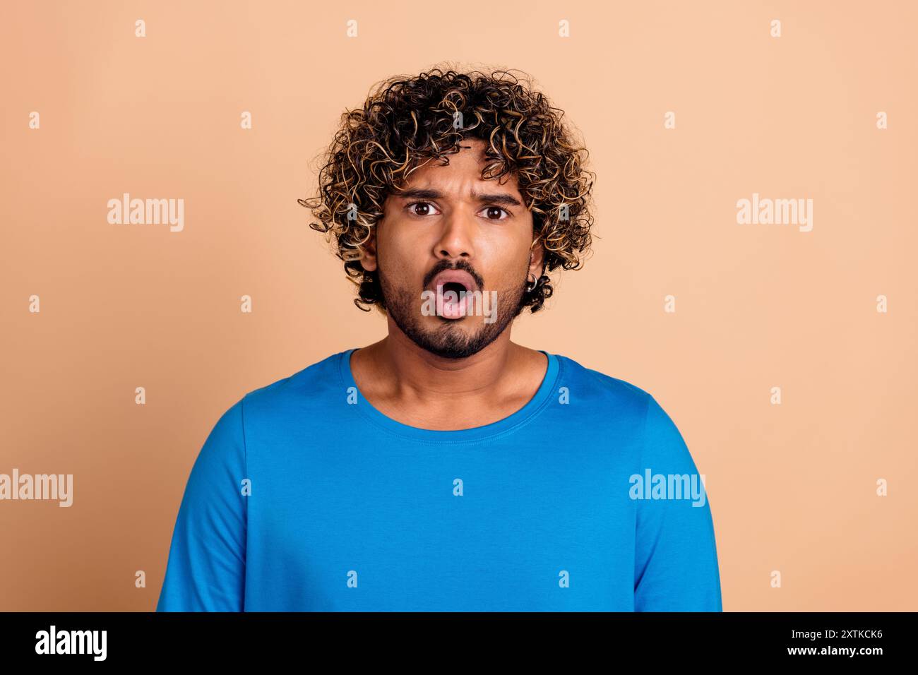 Photo of confused shocked man open mouth wear trendy blue clothes ...