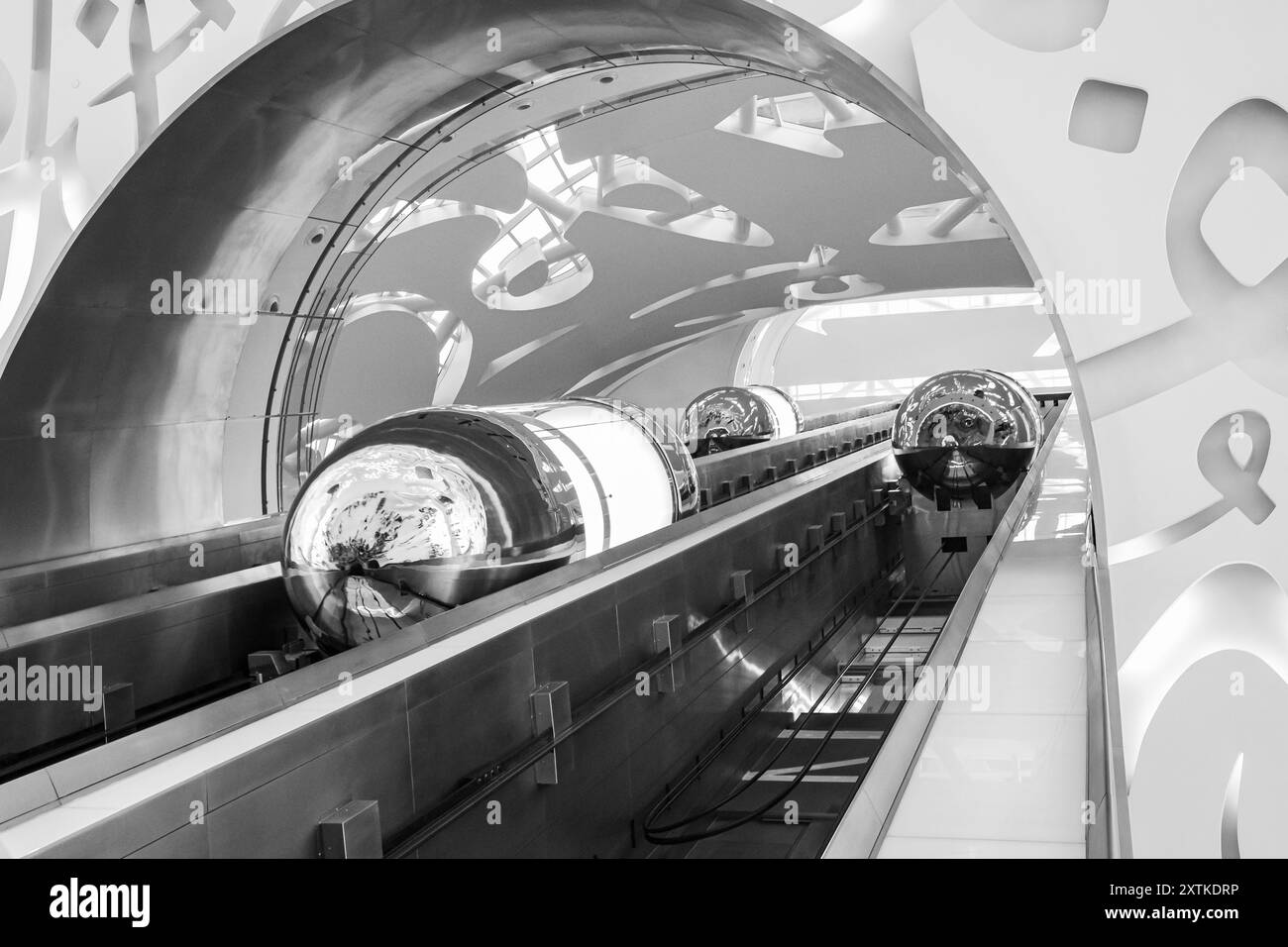 Modern interior and elevators at Museum of the Future. Capsule shape ...
