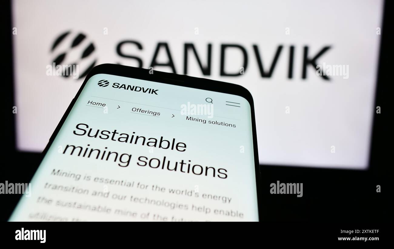 Mobile phone with website of Swedish engineering company Sandvik AB in ...