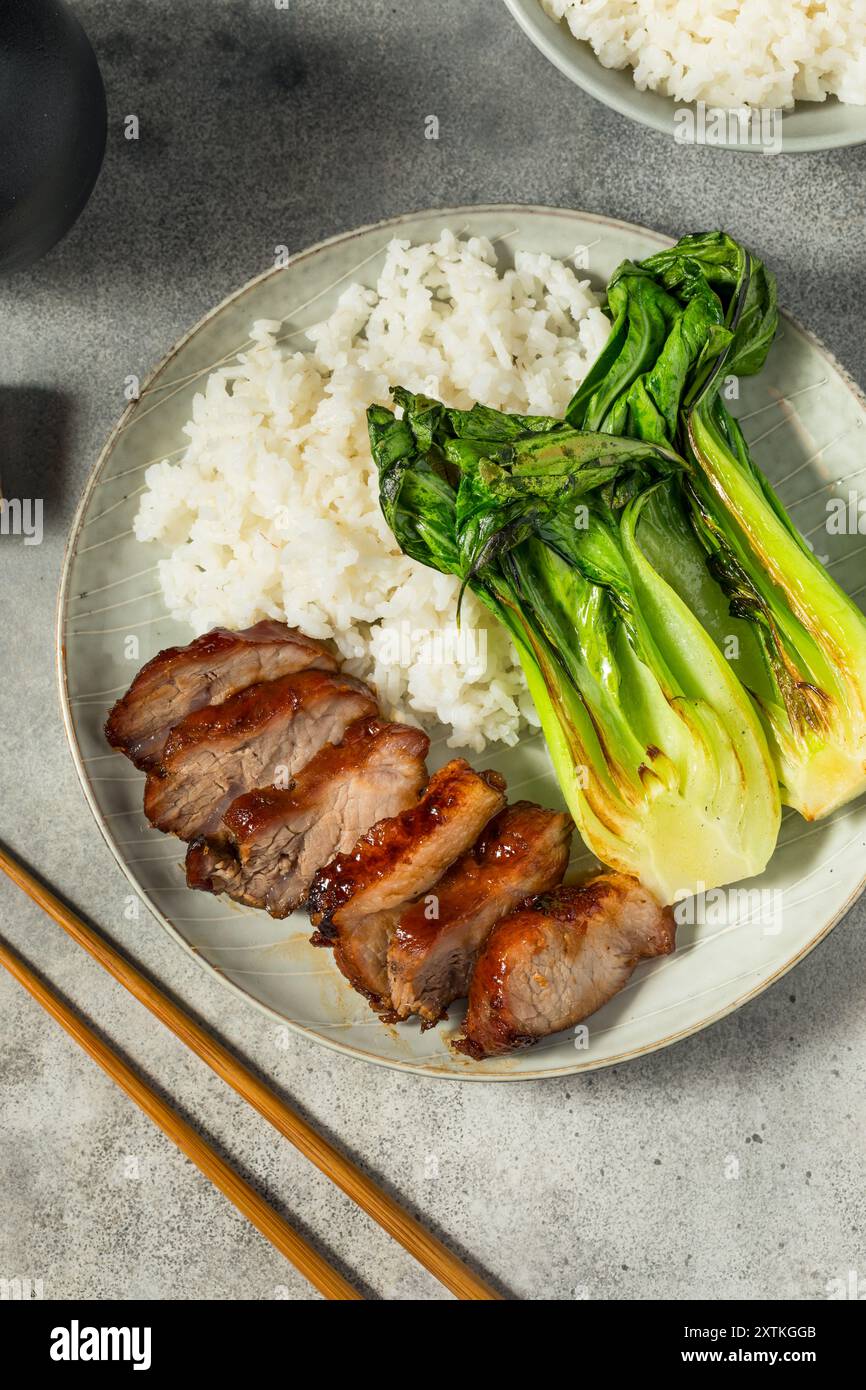 Chinese Char Siu Pork with Bok Choy and White Rice Stock Photo - Alamy