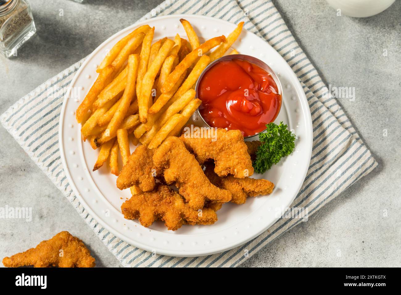 Healthy Kids Dinosaur Chicken Nuggets with Fries and Ketchup Stock ...