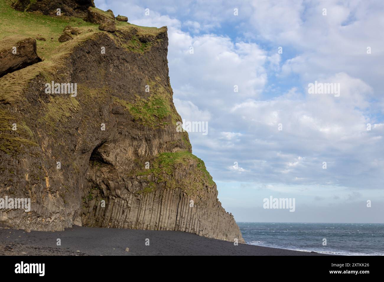 Basalt hexagonal columns rock formation on Reynisfjara Black sand beach ...