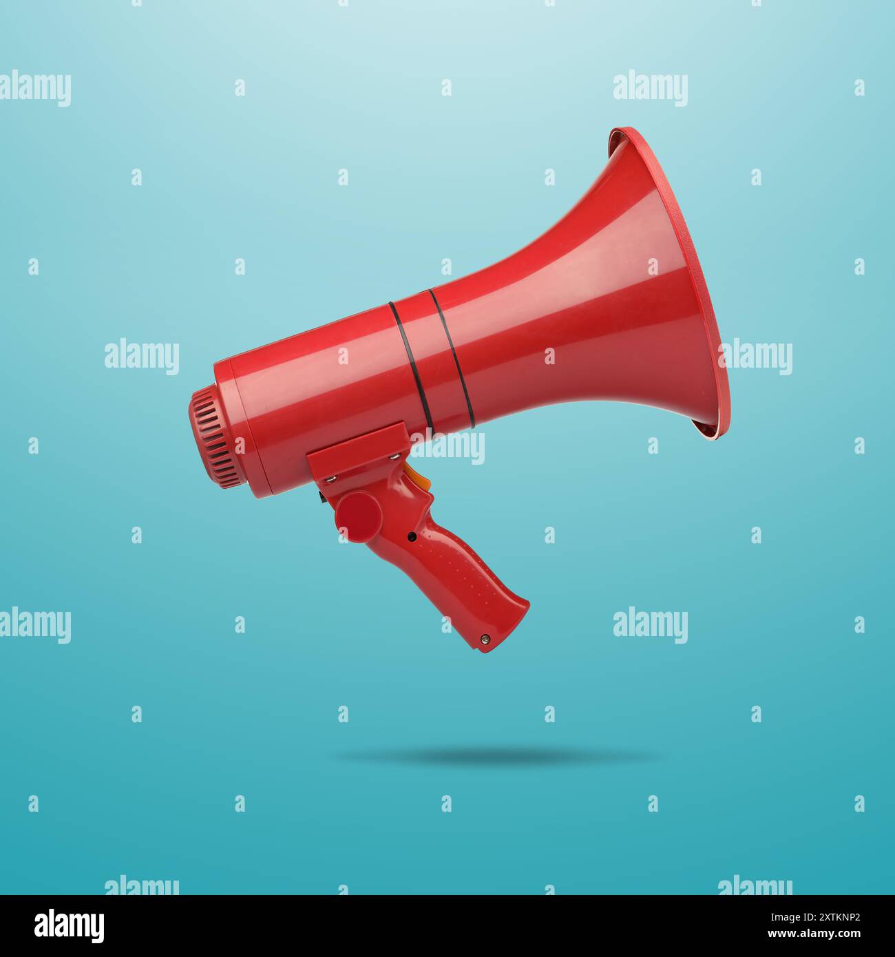 Red megaphone in air on blue gradient background Stock Photo - Alamy